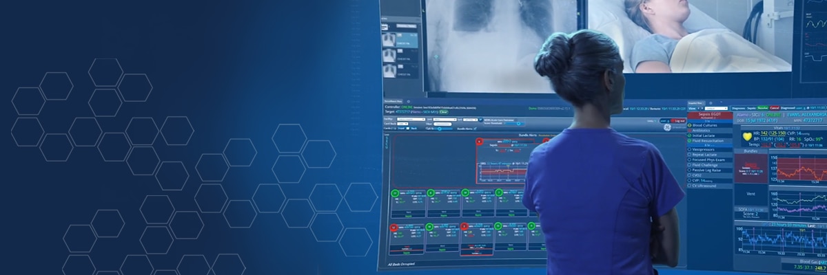 Doctor / nurse / clinician looking at Mural Virtual Care Solution screen Doctor / nurse / clinician looking at Mural Virtual Care Solution screen